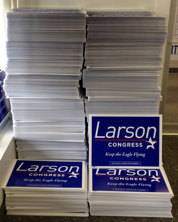 signs at Larson HQ | CT Mirror