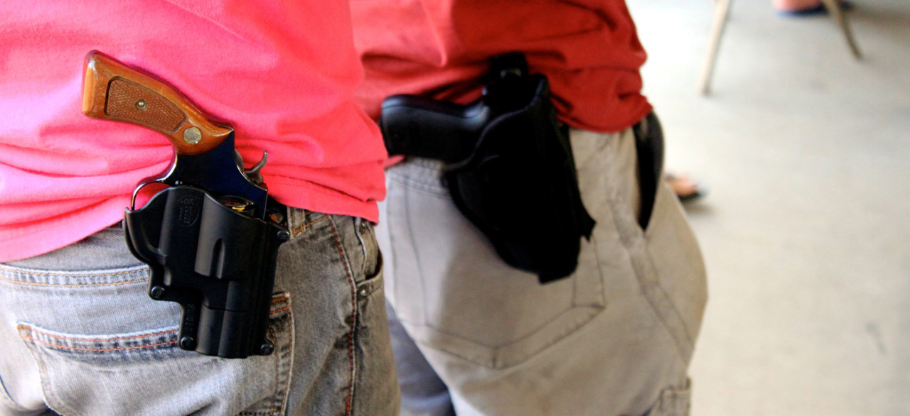 Require open carry gun folks to show their permits -- without being asked