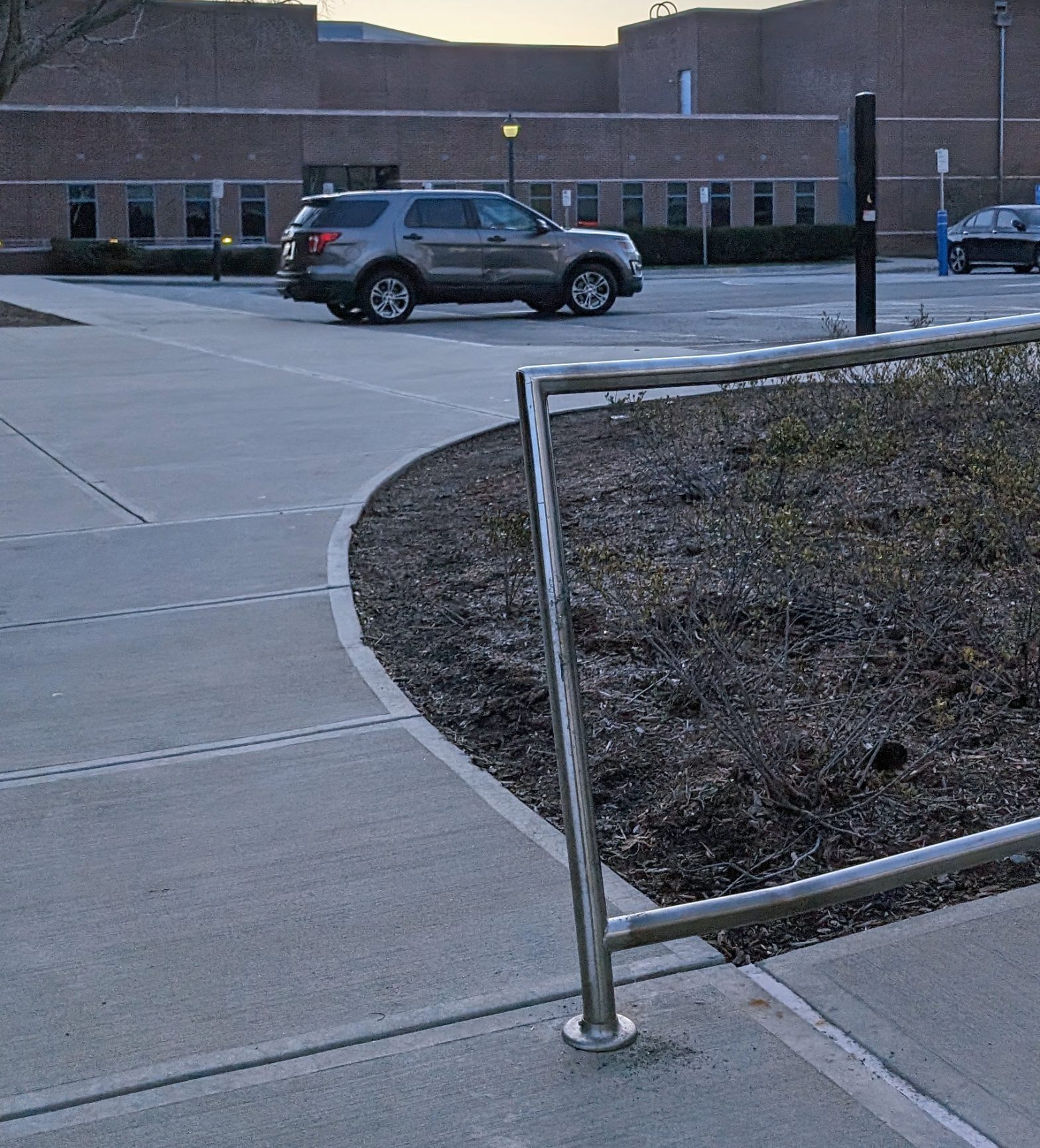 dented-police-car-and-railing | CT Mirror