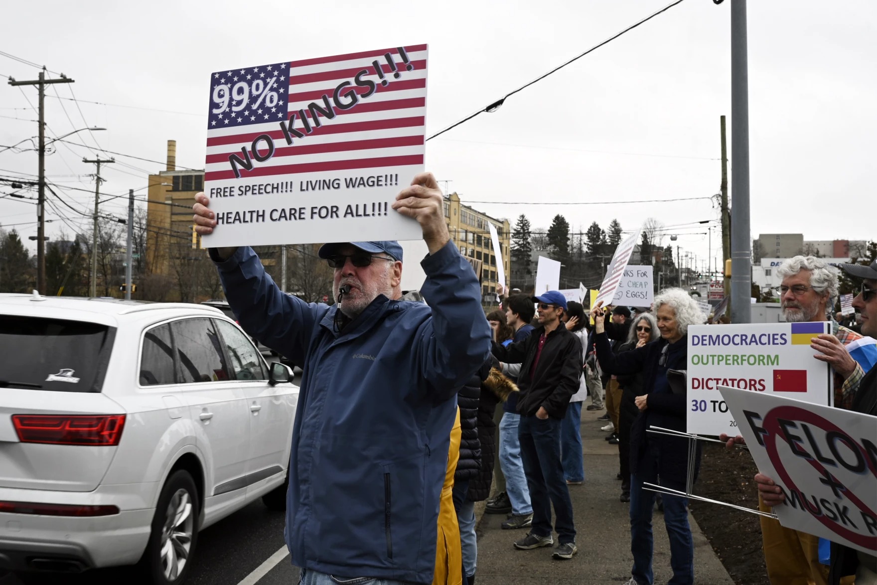 Stamford takes part in nationwide protest against Tesla, Elon Musk